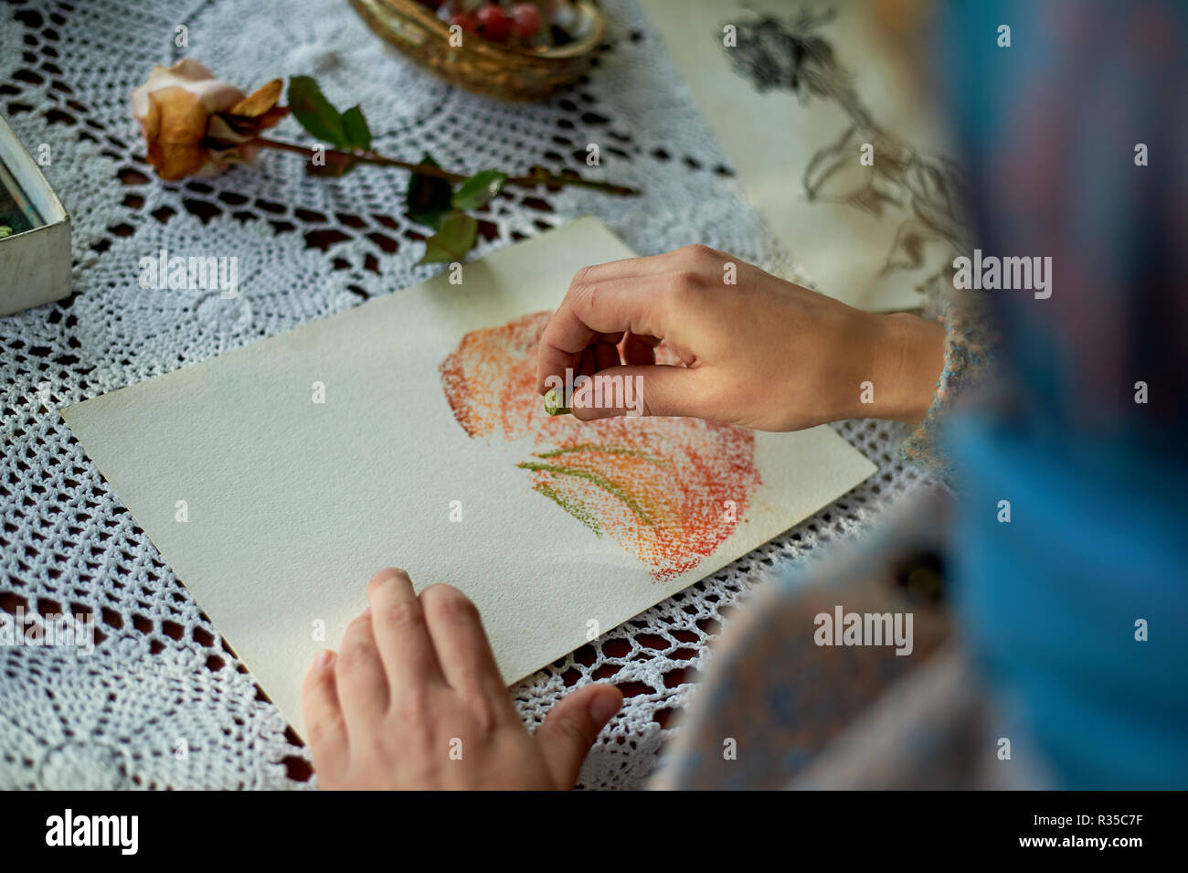 The artist paints with dry pastel. The creative process of painting ...