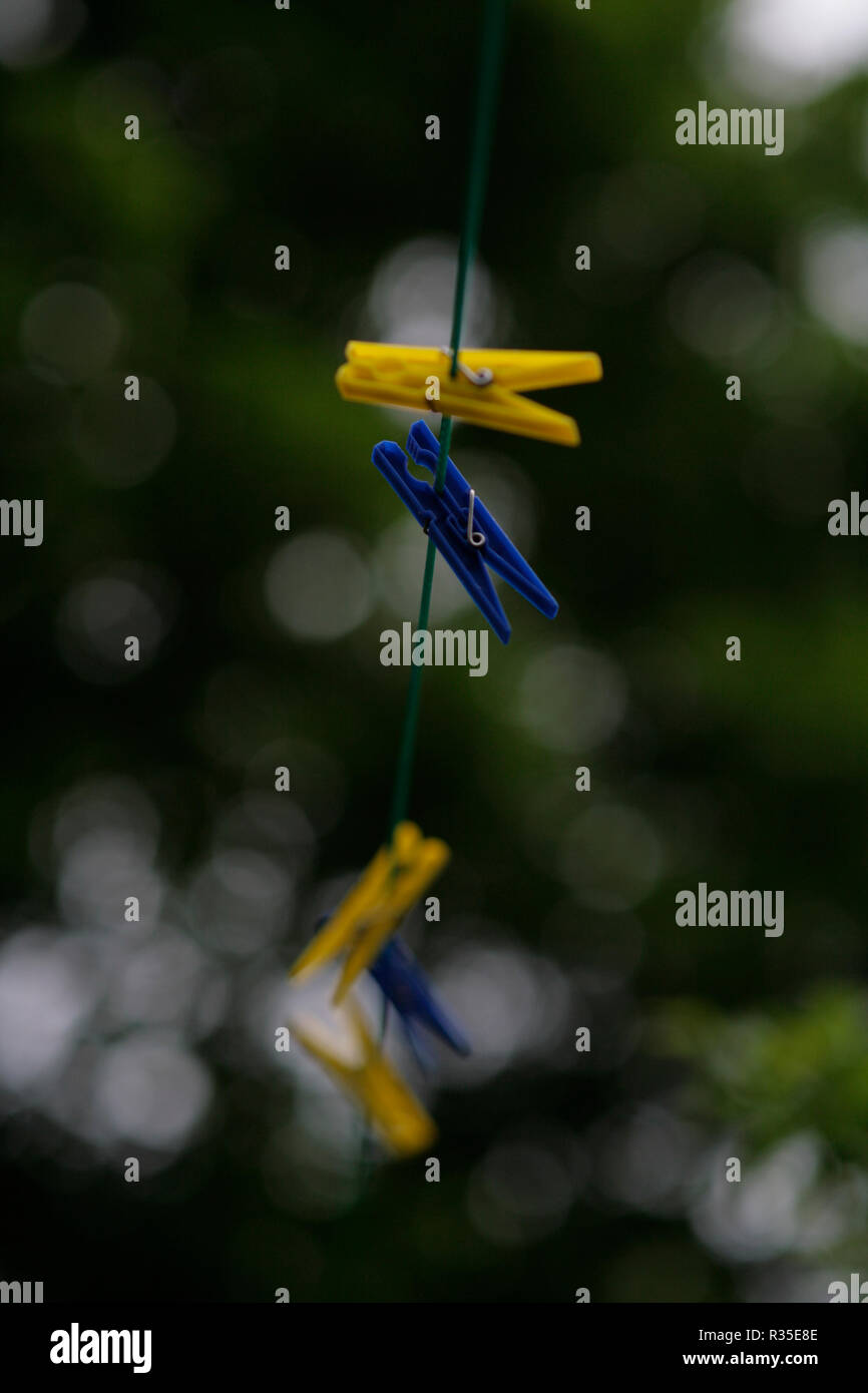 Pegs on a washing line Stock Photo - Alamy