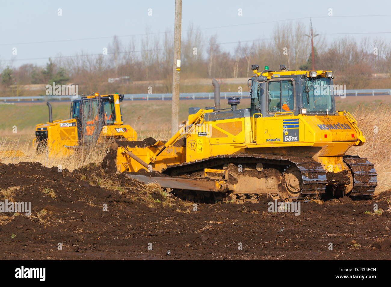 Dozers strip top soil as work starts on the construction of IPORT in ...