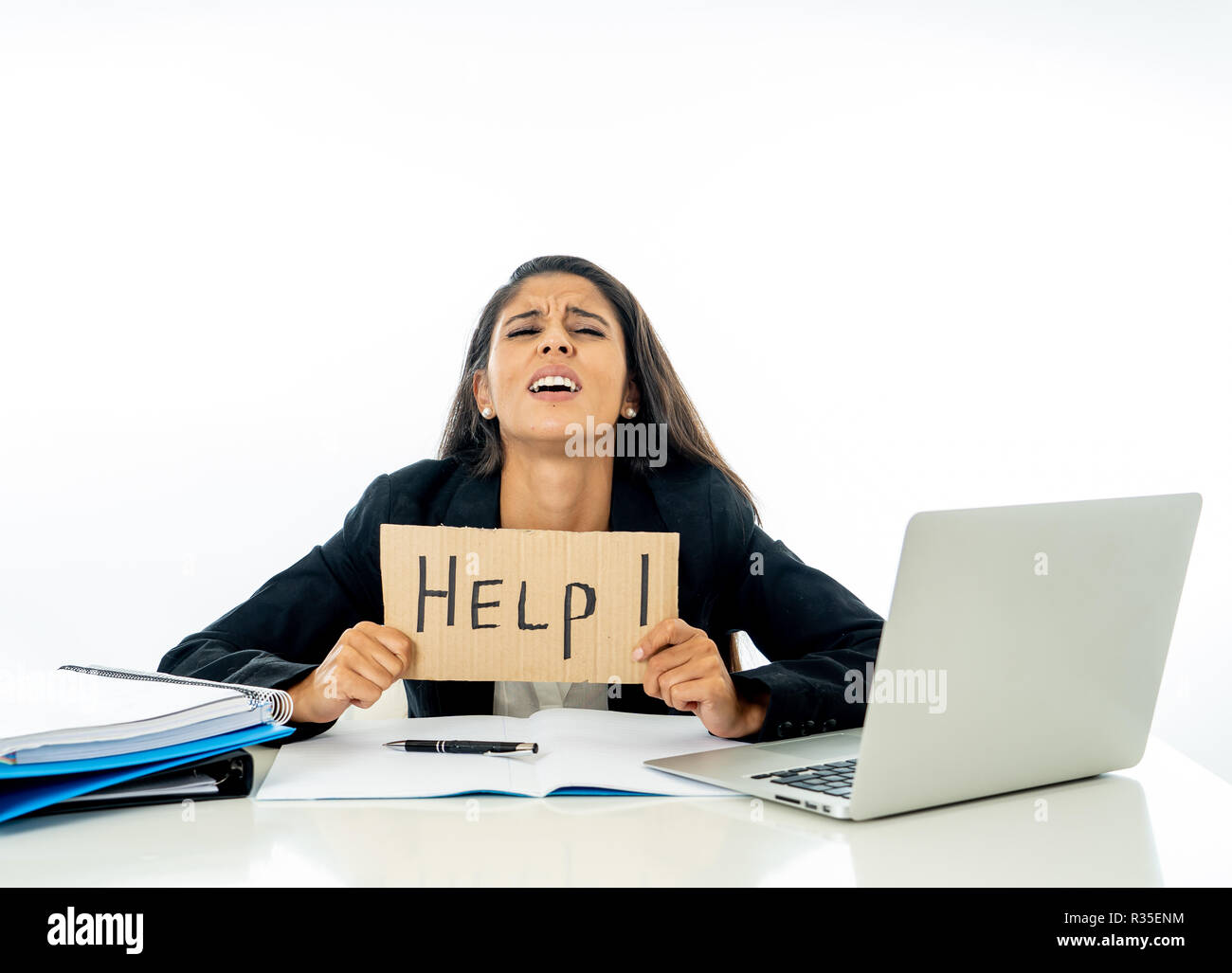 Young attractive businesswoman working on computer laptop suffering ...