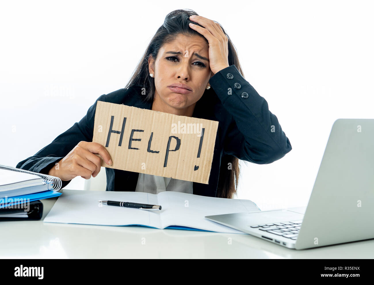 Young attractive businesswoman working on computer laptop suffering ...