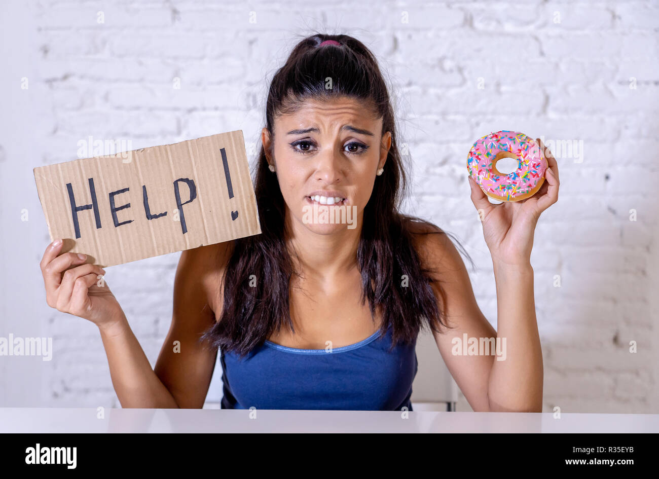 Woman and resisting chocolate hi-res stock photography and images - Alamy