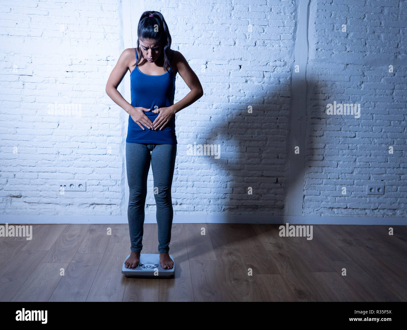 Thin person fat shadow hi-res stock photography and images - Alamy