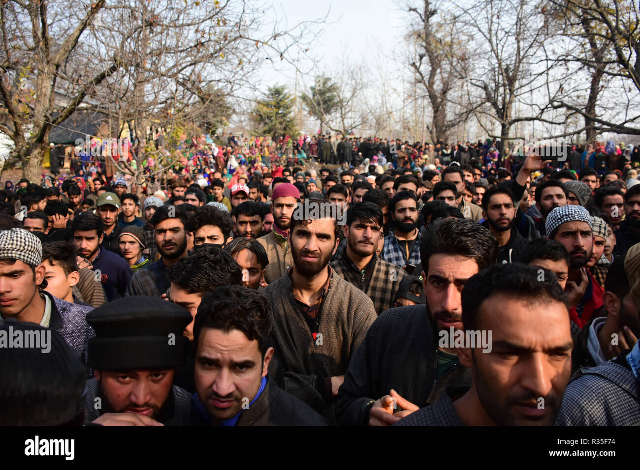 Pulwama, India. 20th Nov, 2018. Kashmiri Muslim people attend the ...