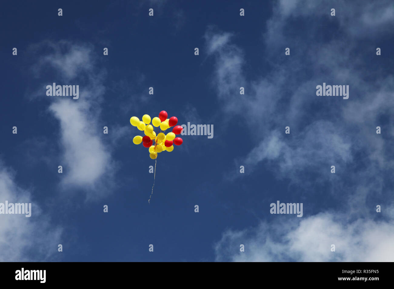 Red balloon floating away hi-res stock photography and images - Alamy