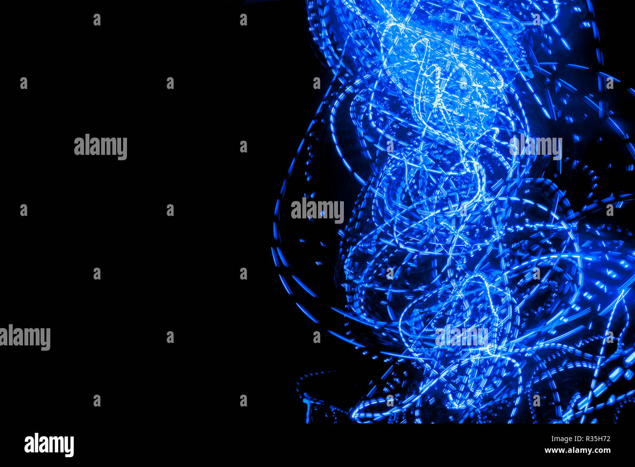 multicolor led light painting round trails abstract background on black ...