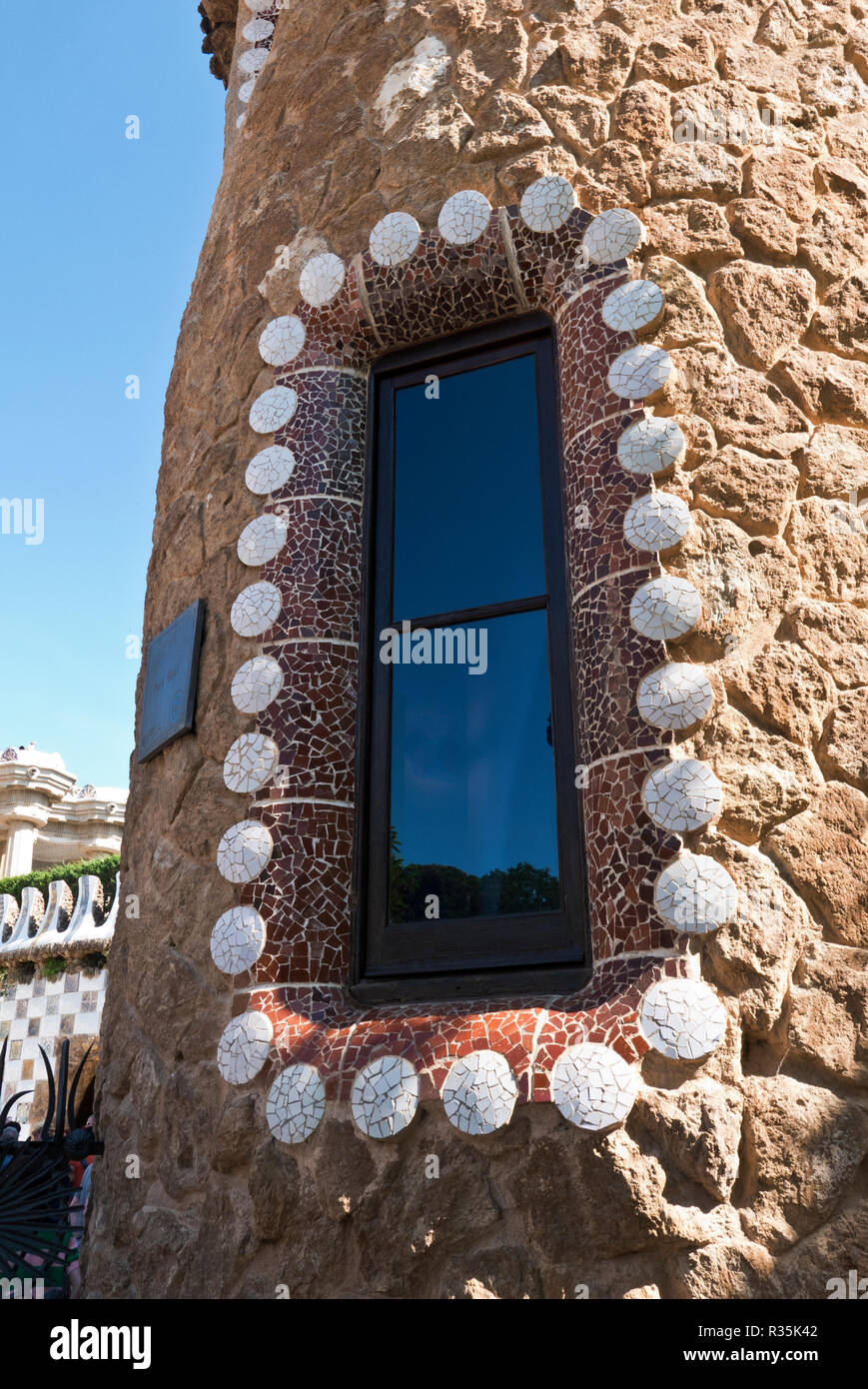 A window from the Pavilion at the Park Guell designed by Antoni Gaudi ...