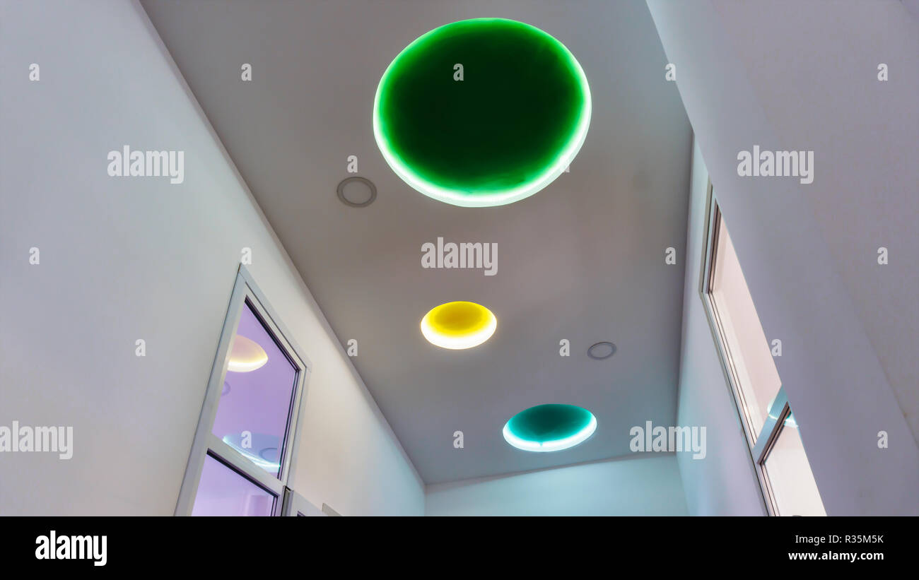 Ultra modern interior design with multi-colored lamps Stock Photo - Alamy