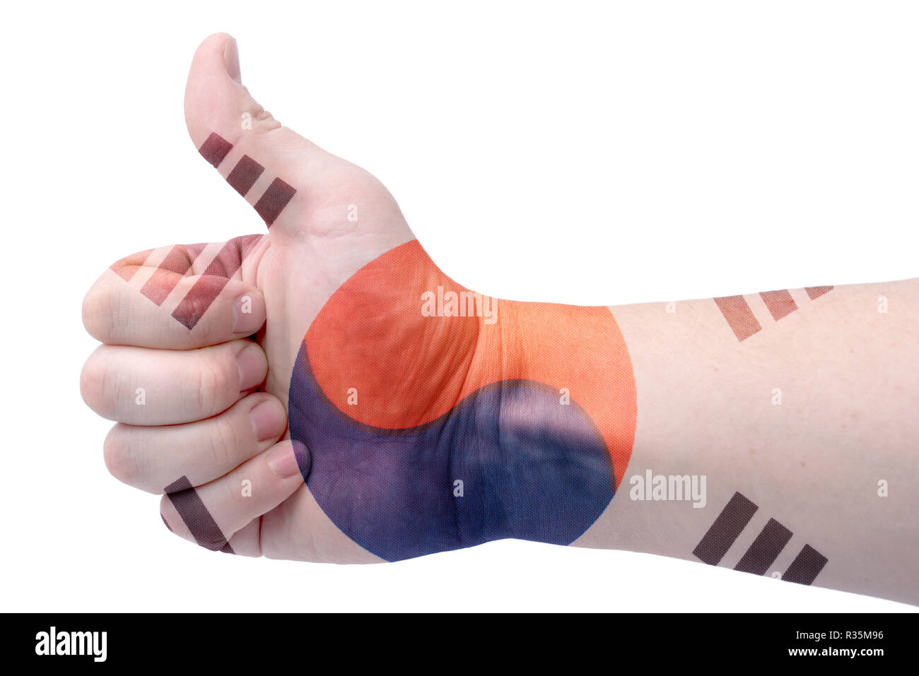 The concept of South Korea-the hand gives a thumbs up with the flag of ...