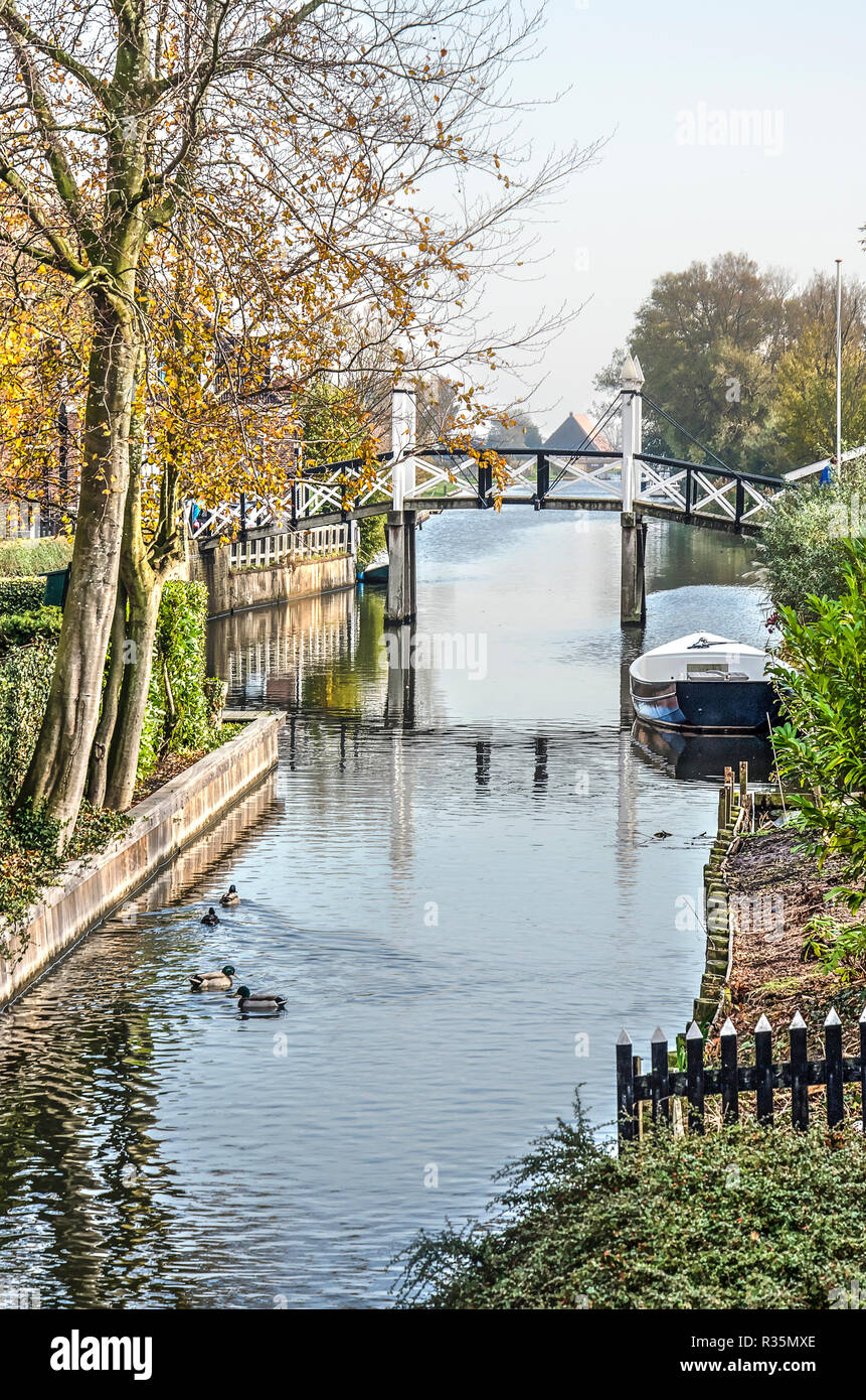Hindeloopen, The Netherlands, November 4, 2018: narrow canal lined with ...
