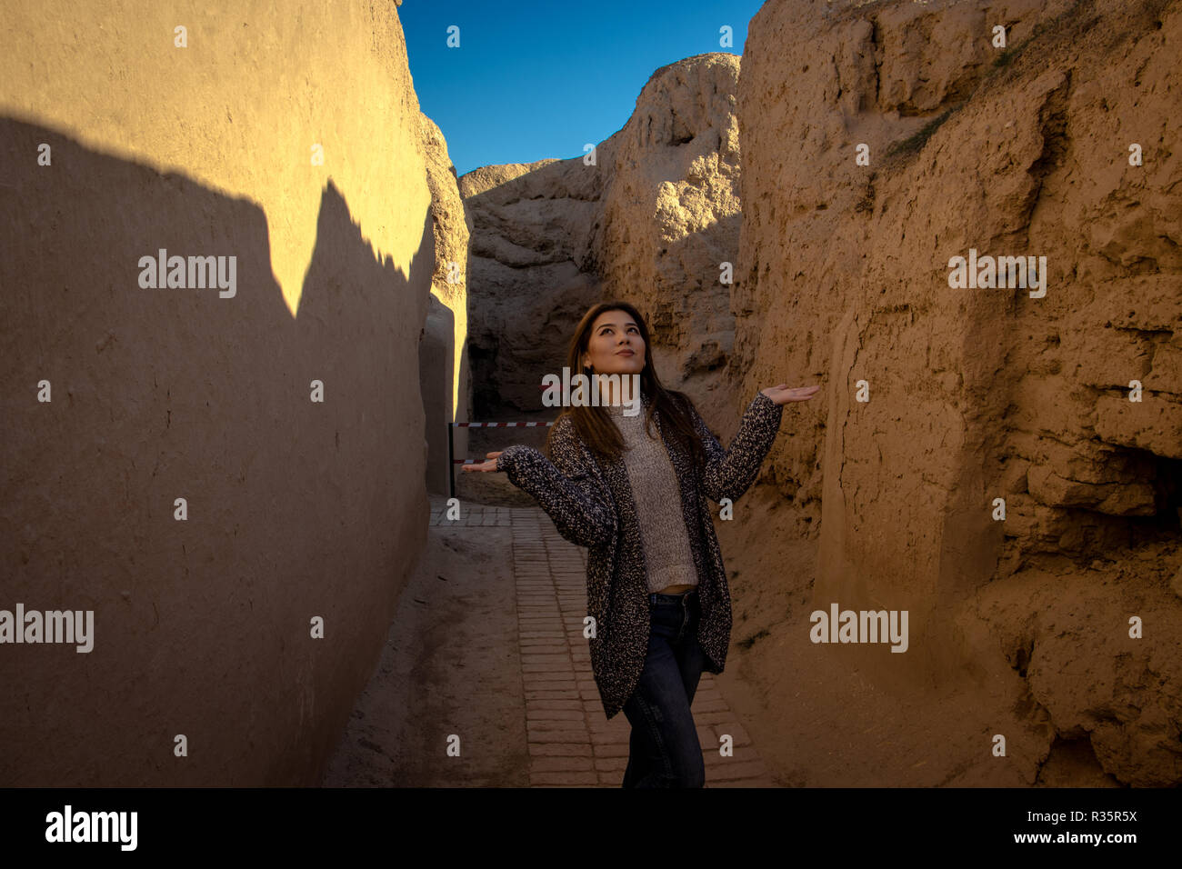 traveler visiting Nisa, ancient Parthian (Iran) fortress in Central ...