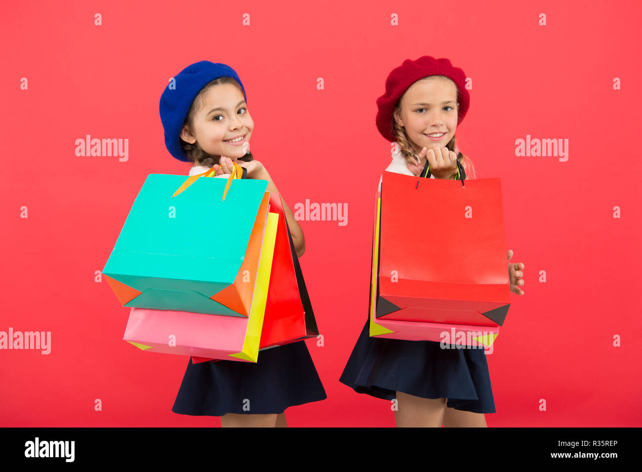 Signs you are addicted to shopping. Kids cute schoolgirls hold bunch ...