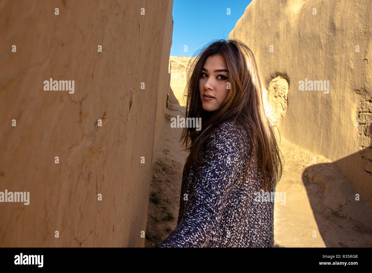 traveler visiting Nisa, ancient Parthian (Iran) fortress in Central ...