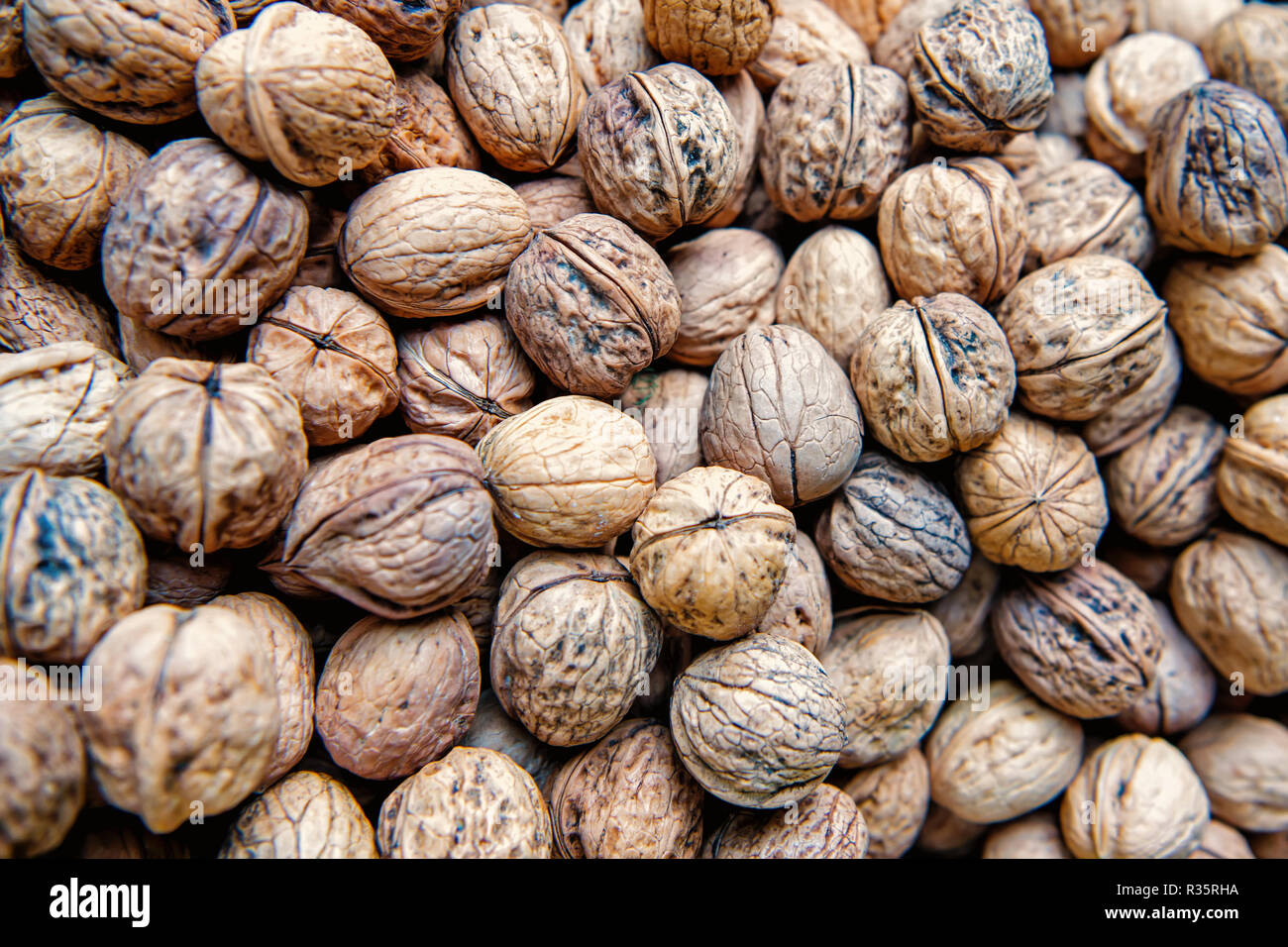 Circassian walnut background or texture, healthy food with a lot of ...