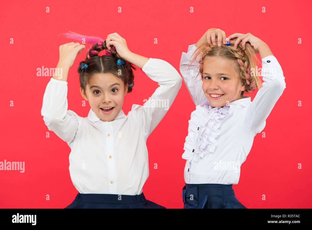 Keep hair braided for tidy look. Kids pupils play with long braided ...