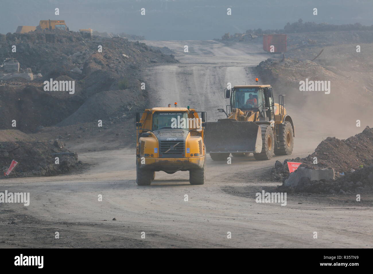 A Volvo A40 ADT & Caterpillar 966K Wheeled Loader at work on the old ...