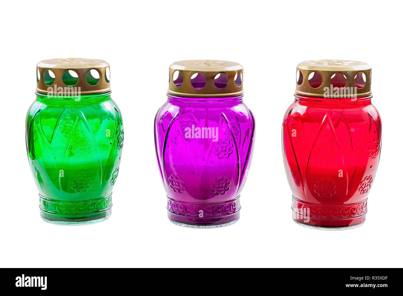 colored votive candles on a white background Stock Photo - Alamy