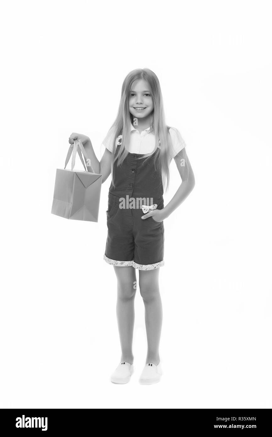 Little shopaholic. Child buy modern items in mall. Girl smiling happy ...