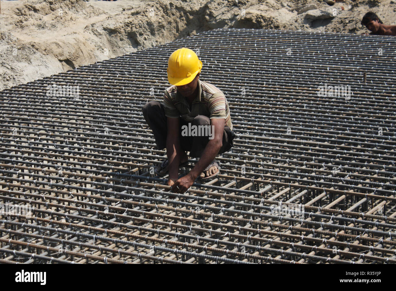 Bangladeshi labor works in a Construction site in Dhaka, Bangladesh ...
