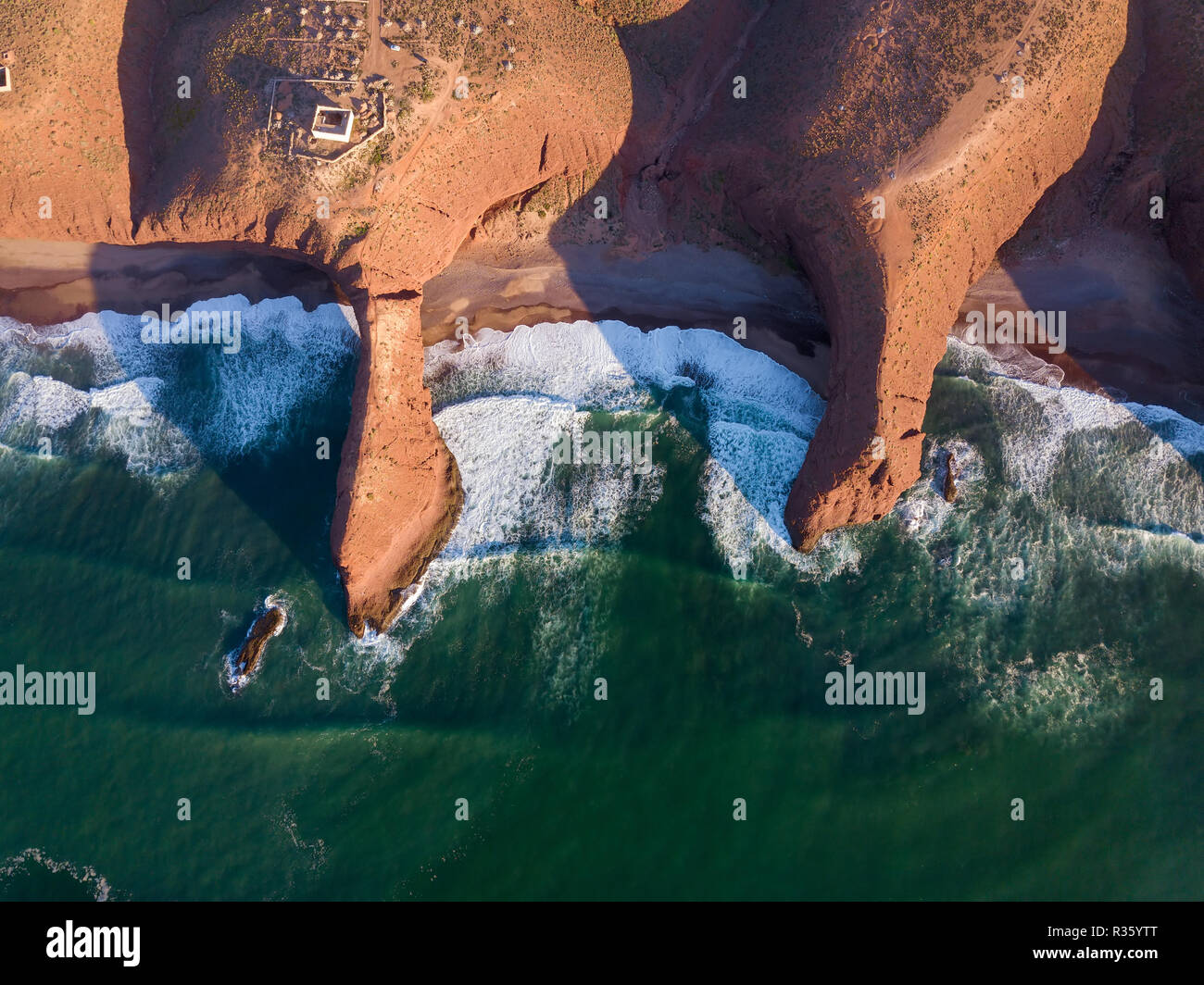 Aerial top view on Legzira beach with arched rocks on the Atlantic ...