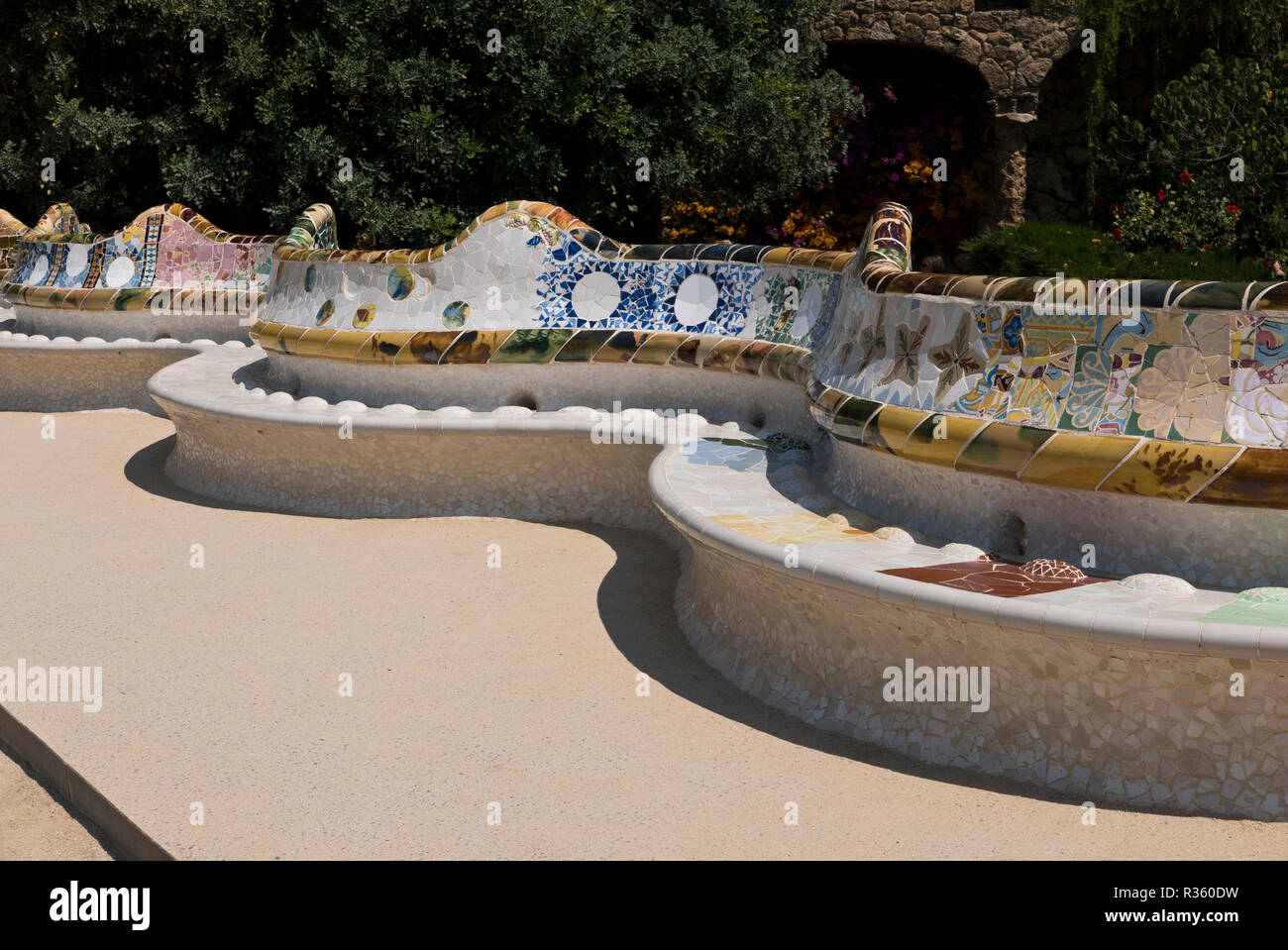 Colourful mosaic designs on the back of benches designed by Antoni ...