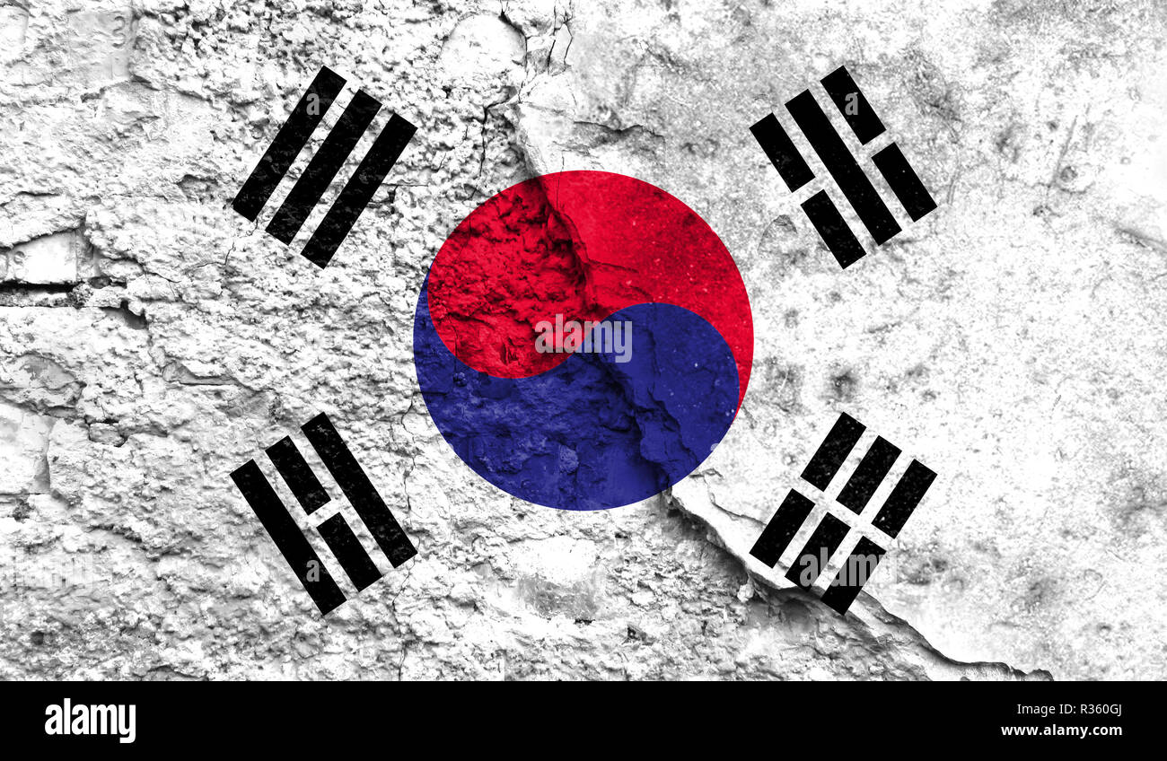 Flag of South Korea close up painted on a cracked wall, concept of ...