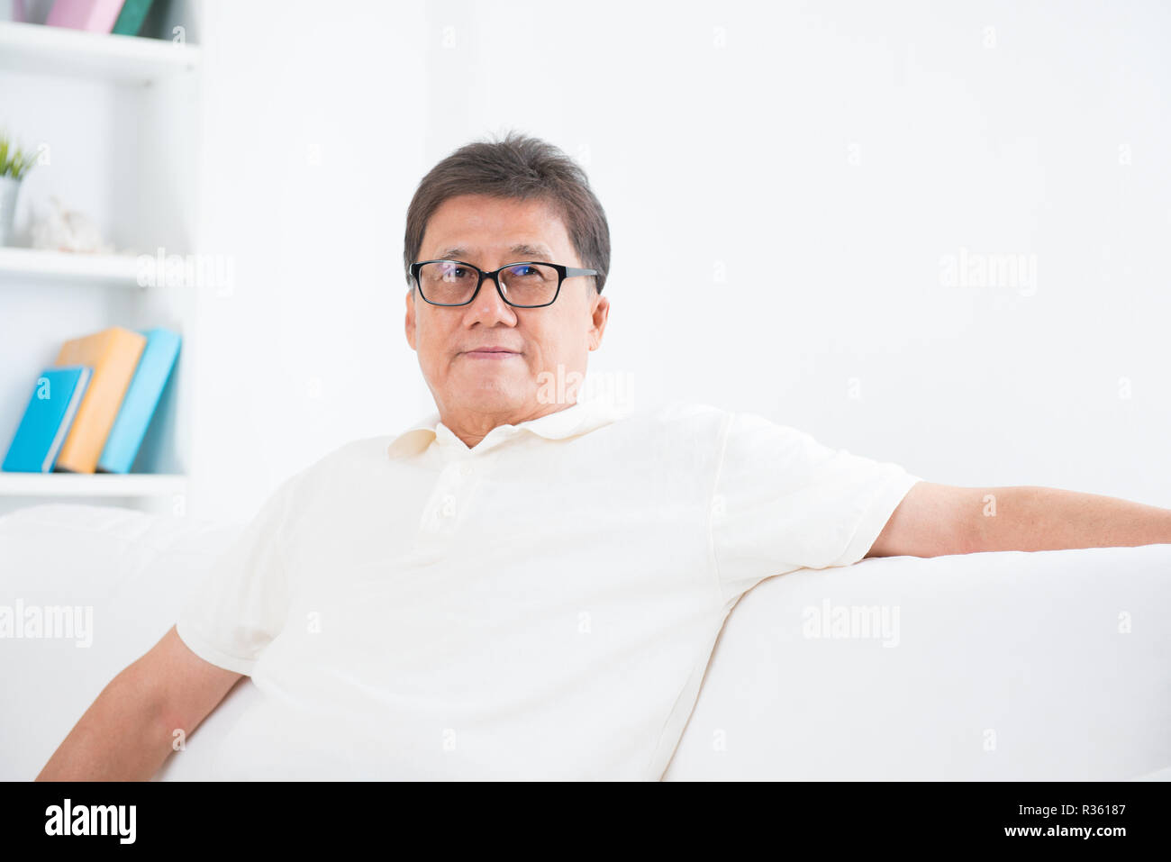 Chinese man seated relaxed business hi-res stock photography and images ...