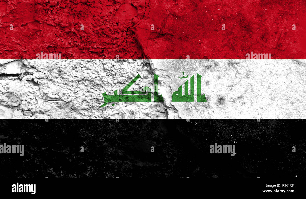 Flag of Iraq close up painted on a cracked wall, concept of armed ...