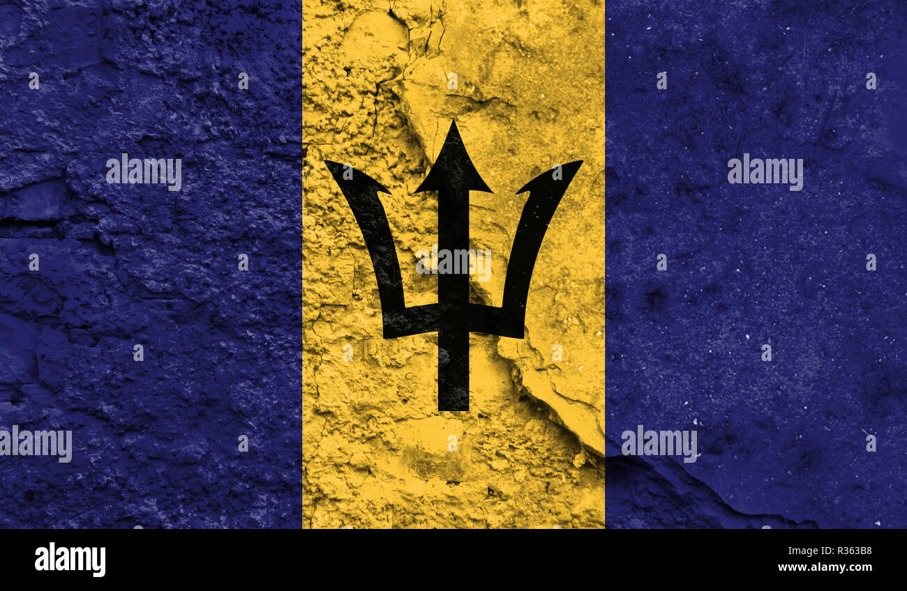 Flag of Barbados close up painted on a cracked wall, concept of armed ...