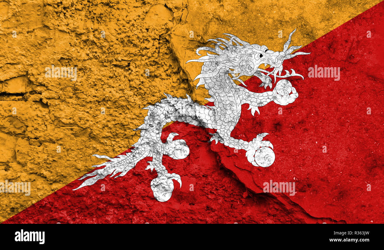 Flag of Butane close up painted on a cracked wall, concept of armed ...