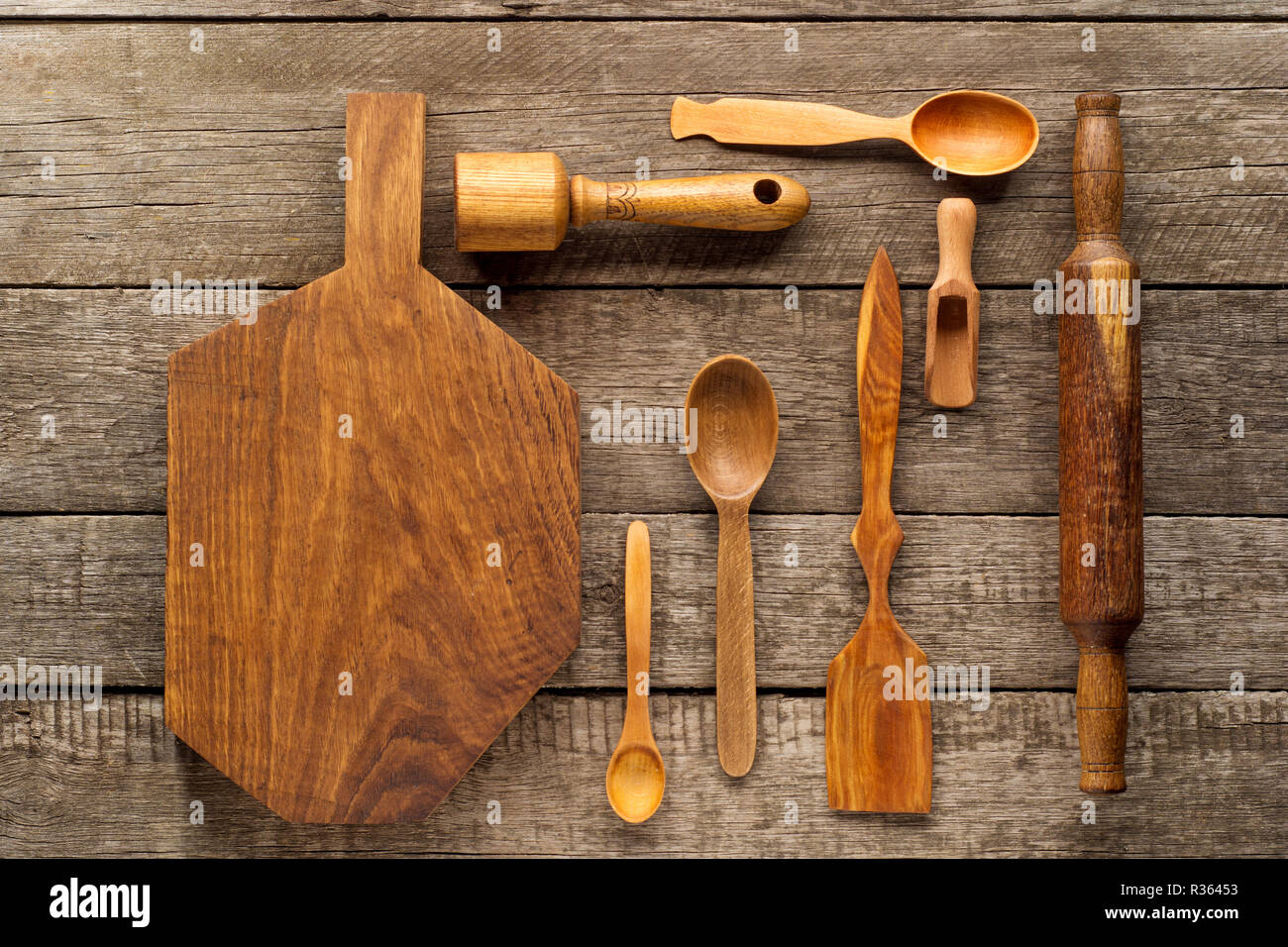 Rural kitchen utensils on vintage planked wood table from above. Rustic ...