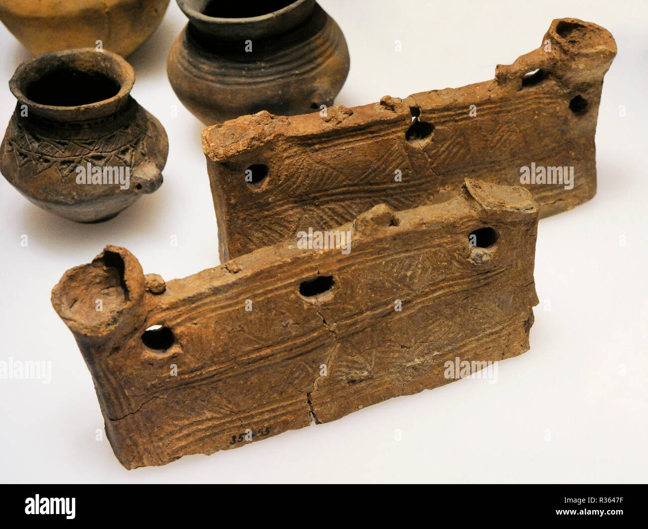Loom weights hi-res stock photography and images - Alamy