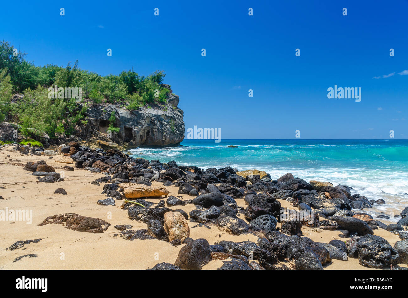 Rocks along Shipwreck Beach in Kauai, Hawaii, USA Stock Photo - Alamy