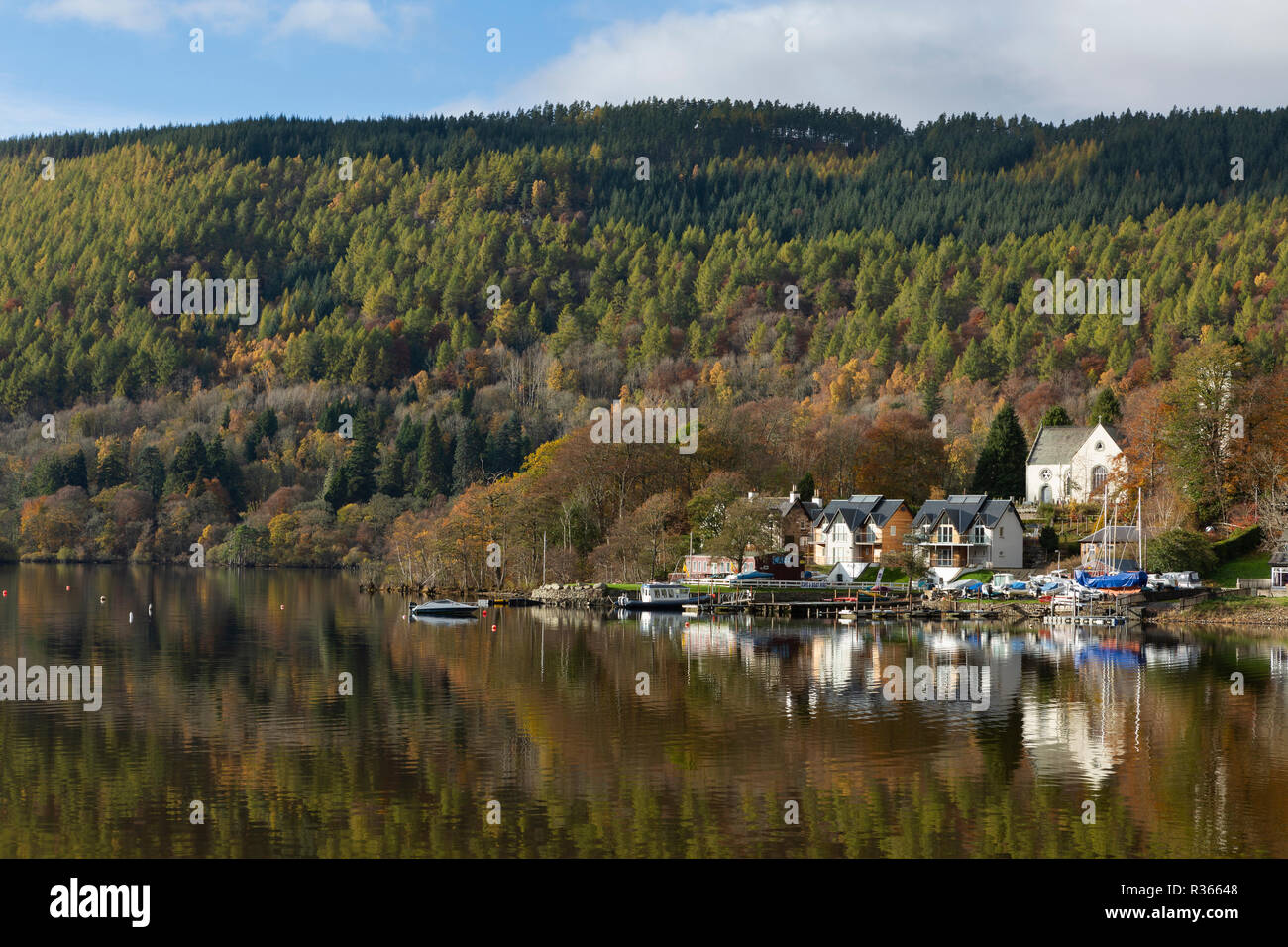 Boats moored by the jetty at Kenmore, Loch Tay, Perth and Kinross ...