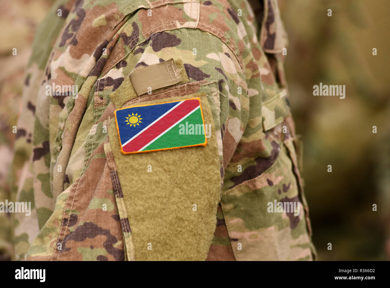 Namibia flag on soldiers arm. Namibia troops (collage Stock Photo - Alamy