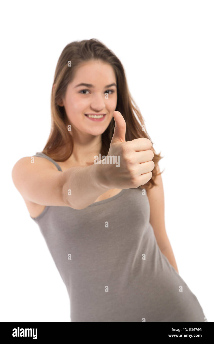 young woman doing thumbs up Stock Photo - Alamy