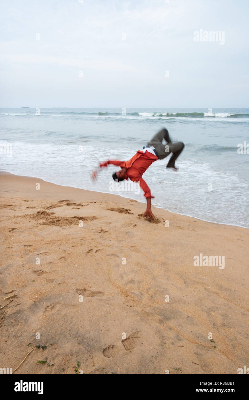 Chennai, India - September 6, 2007: Aman performs a somersault near the ...