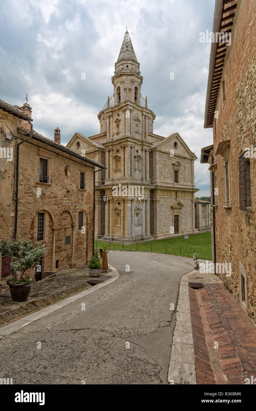 View of the Sanctuary of the Madonna di San Biagio. Street scene with a ...