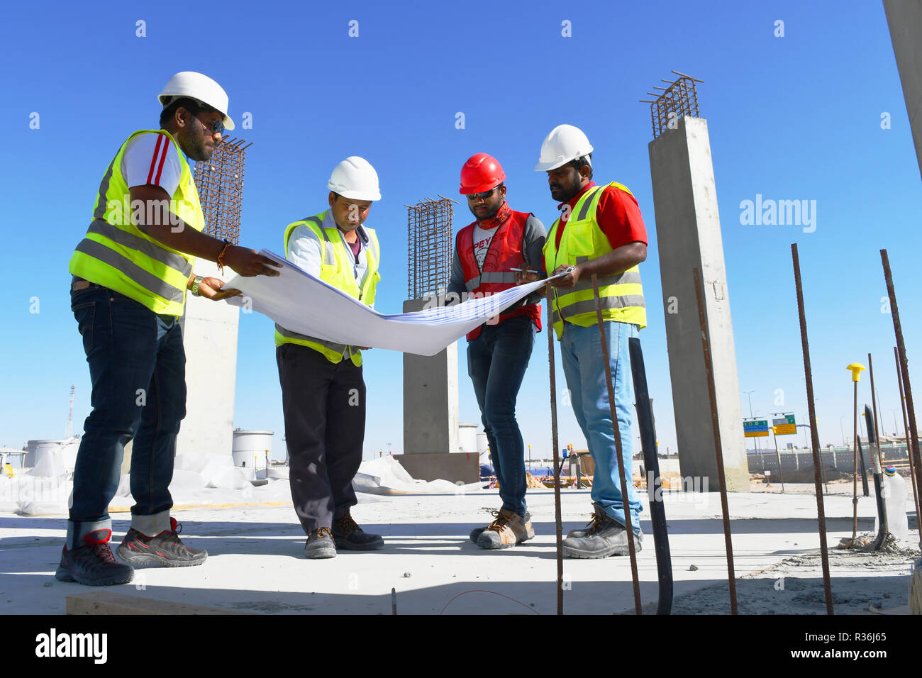 Men working together in construction projects Stock Photo - Alamy