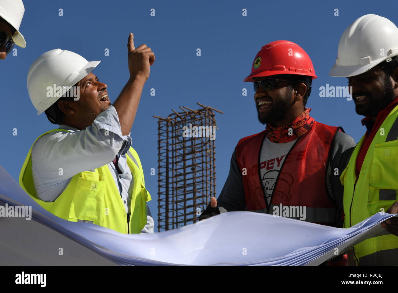 Men working together in construction projects Stock Photo - Alamy