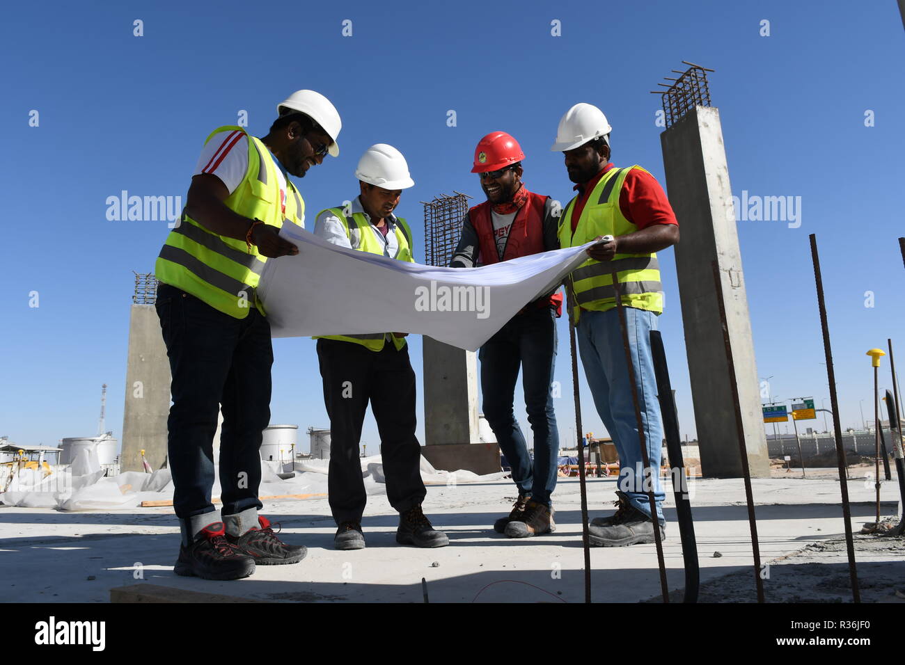 Men working together in construction projects Stock Photo - Alamy
