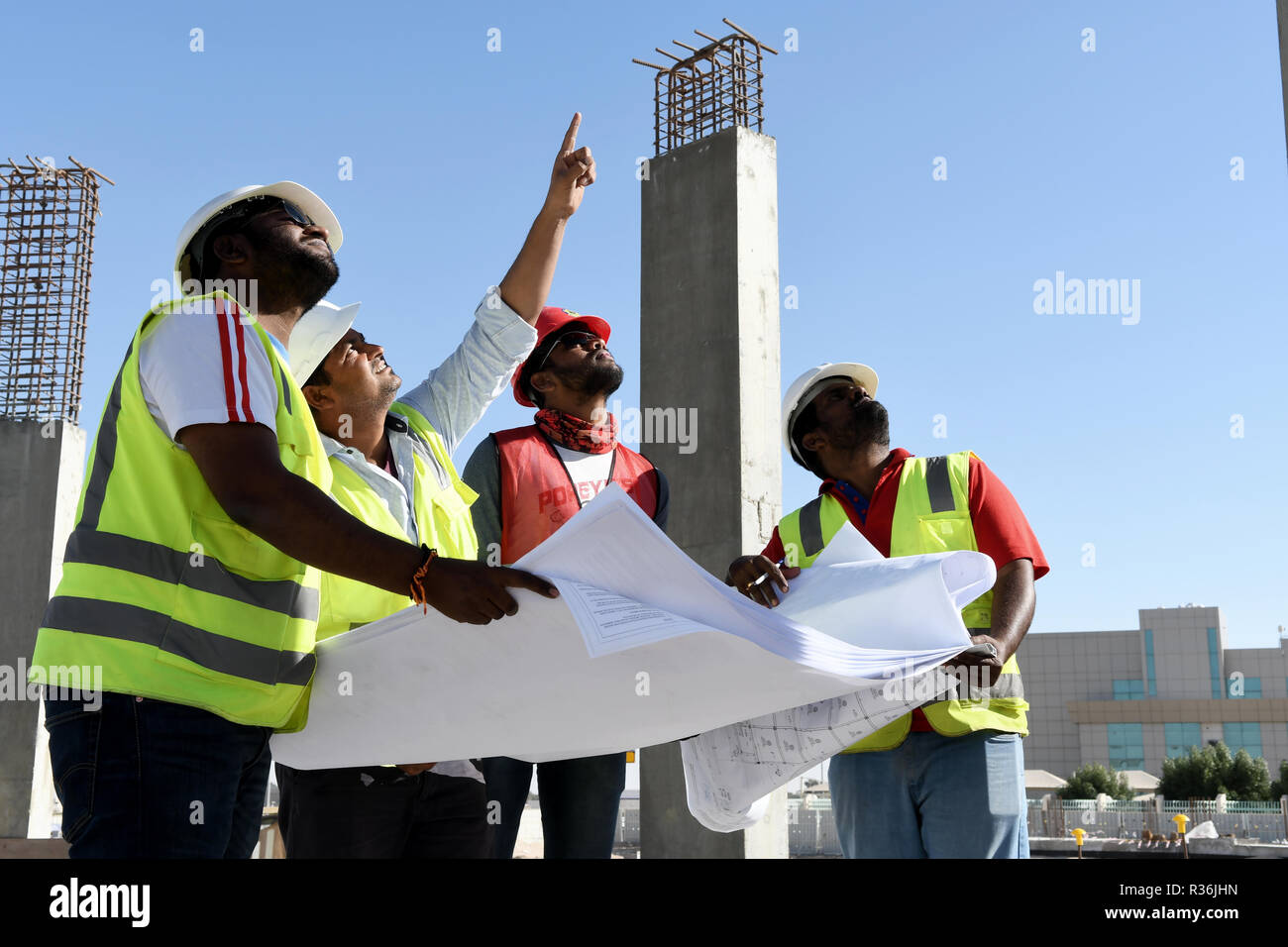 Men working together in construction projects Stock Photo - Alamy