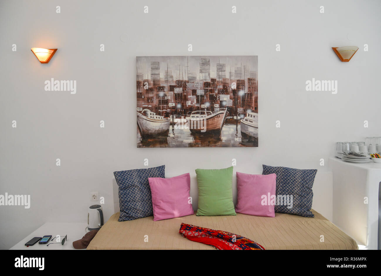 Living room with sofa and colorful pillows - Greek style Stock Photo ...