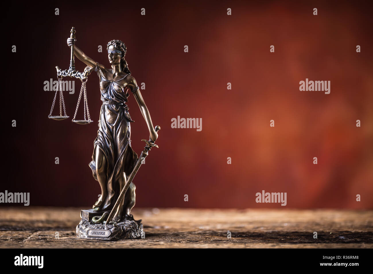 Lady justice statue law table hi-res stock photography and images - Alamy