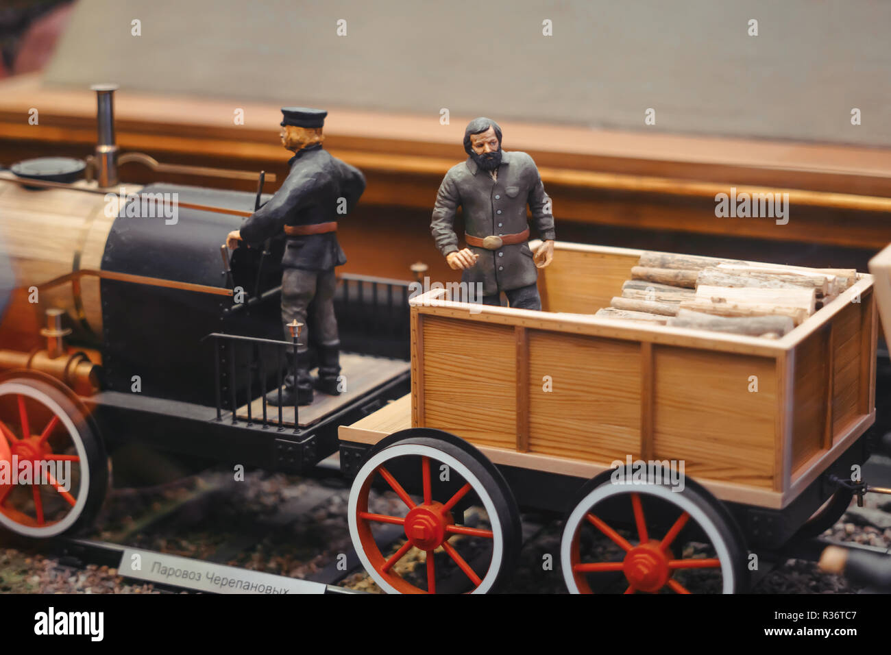 Black model Locomotive on track layout with headlamp Stock Photo - Alamy