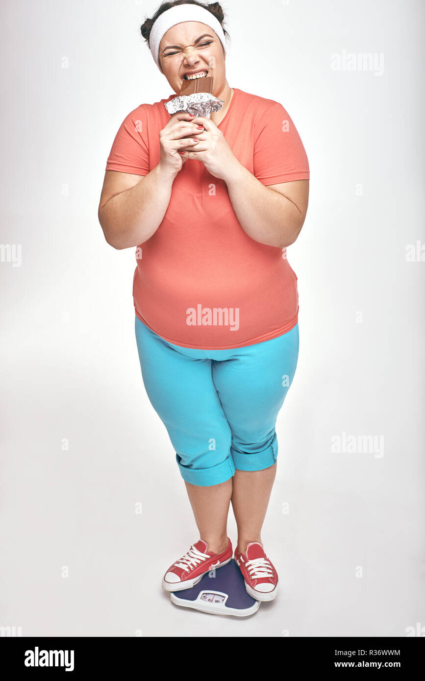 Fat woman scales hi-res stock photography and images - Alamy