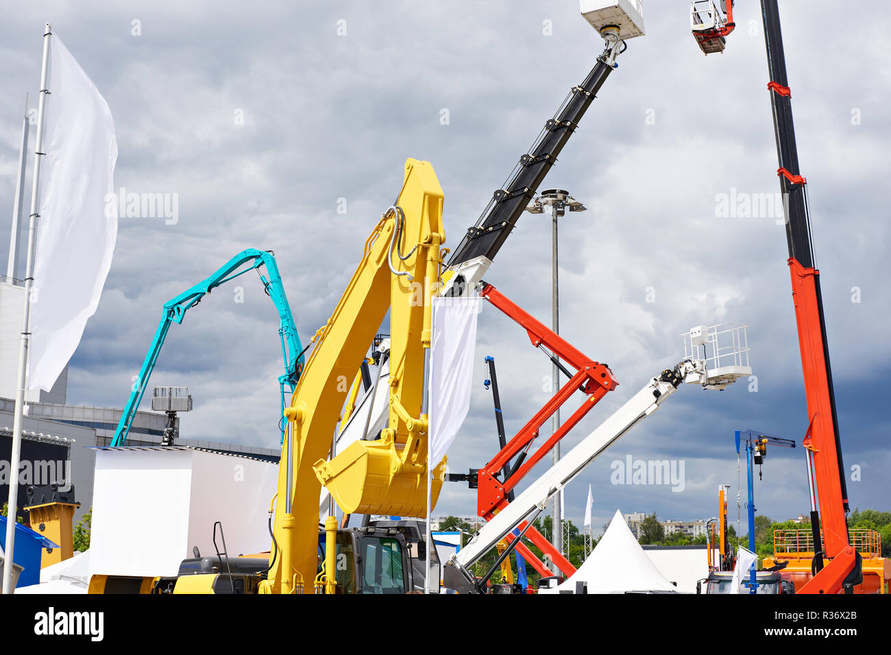 Hydraulic platforms and construction machinery at the trade fair Stock ...