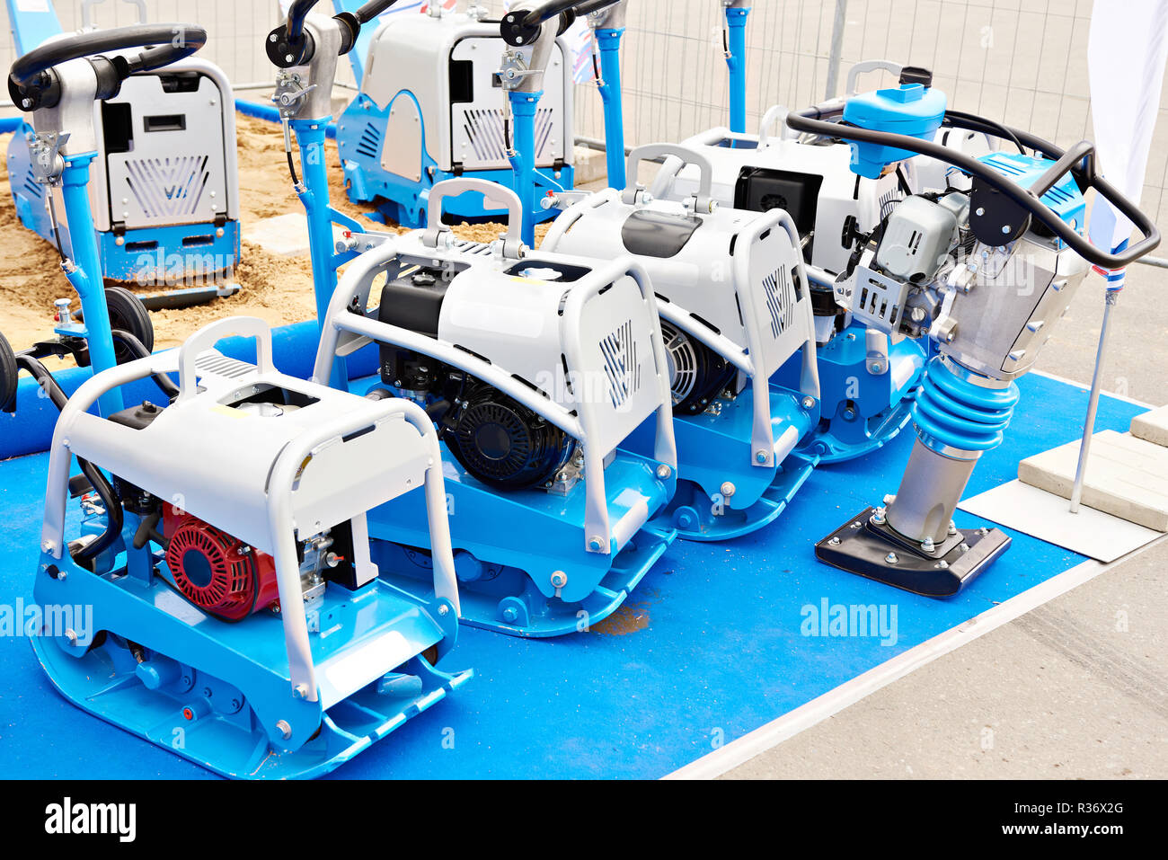 Diesel reversible plate compactors in exhibition Stock Photo - Alamy