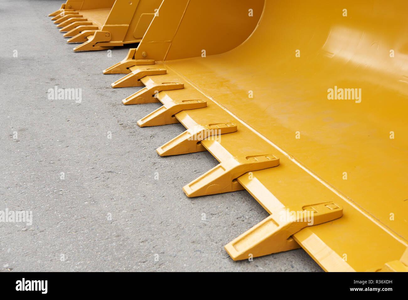 Two new front loader buckets Stock Photo - Alamy