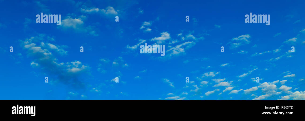 Panoramic photograph of blue sky with clouds background Stock Photo - Alamy